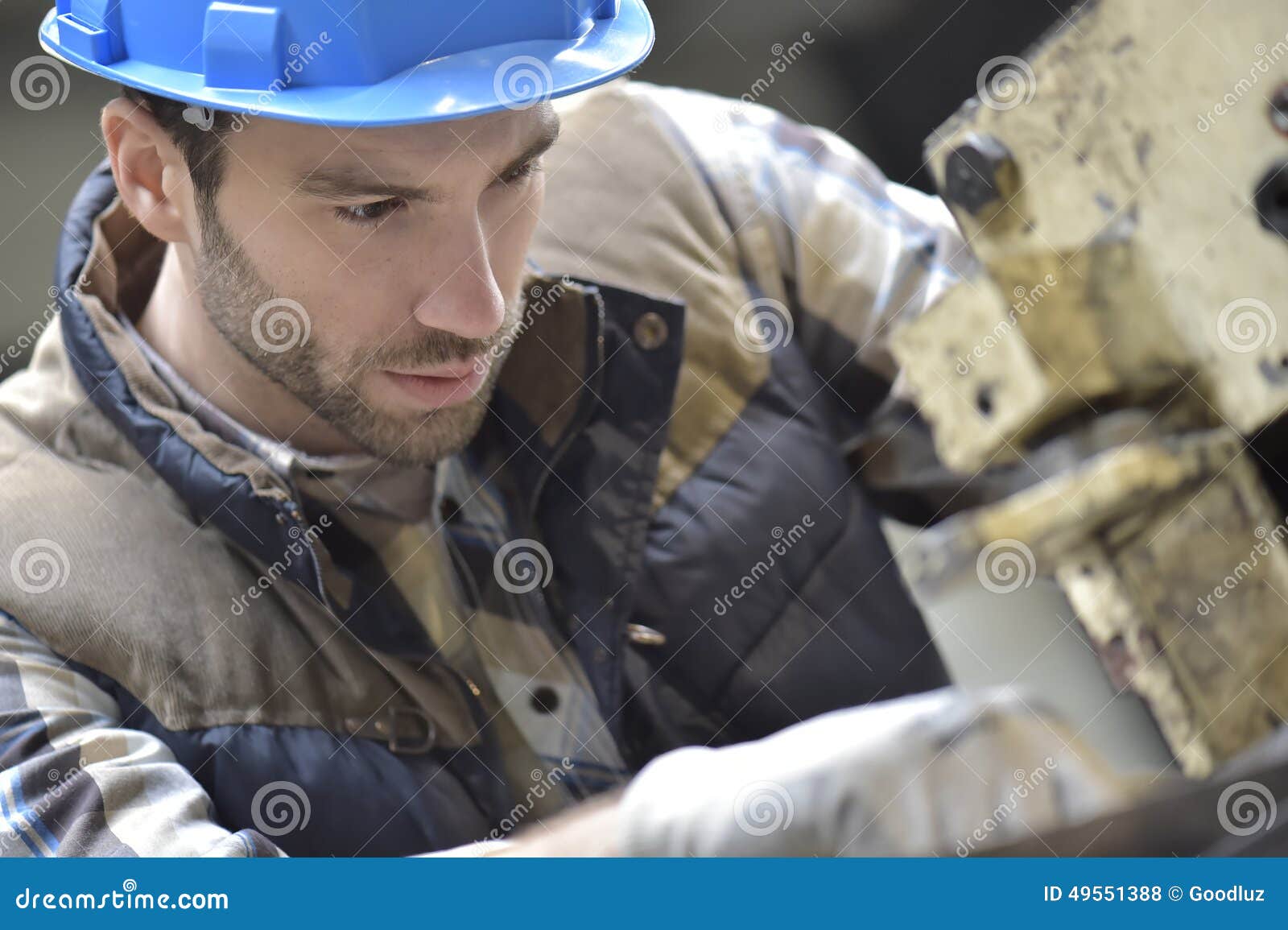 Industrial Worker Working on a Machine Stock Photo - Image of factory ...
