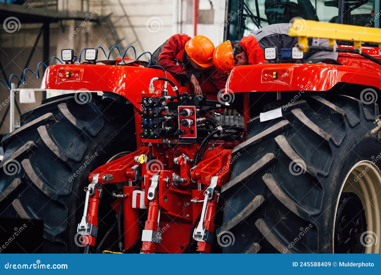 Industrial Workers Assembles Agricultural Tractor in Workshop Stock ...