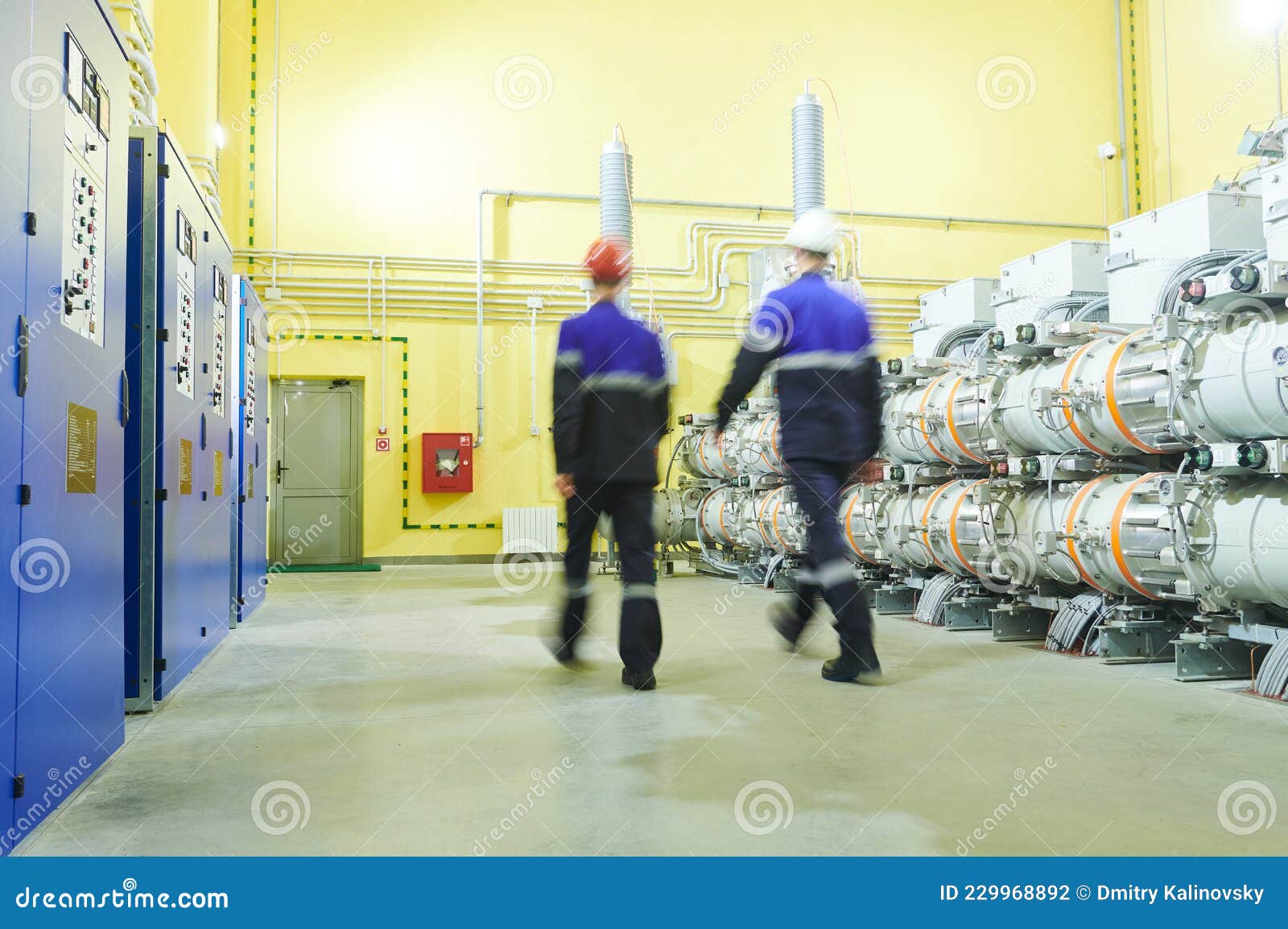 Industrial Technicians Walks at Power Energy Supply Factory Stock Photo ...