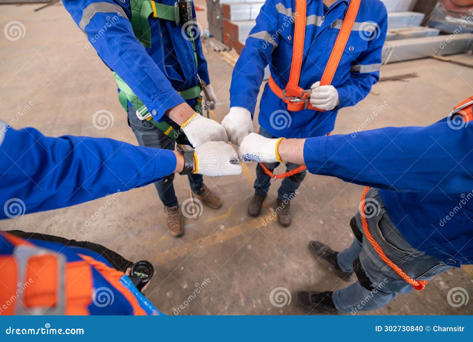 Industrial Workers Standing with Fist Bump Gesture Showing Their ...