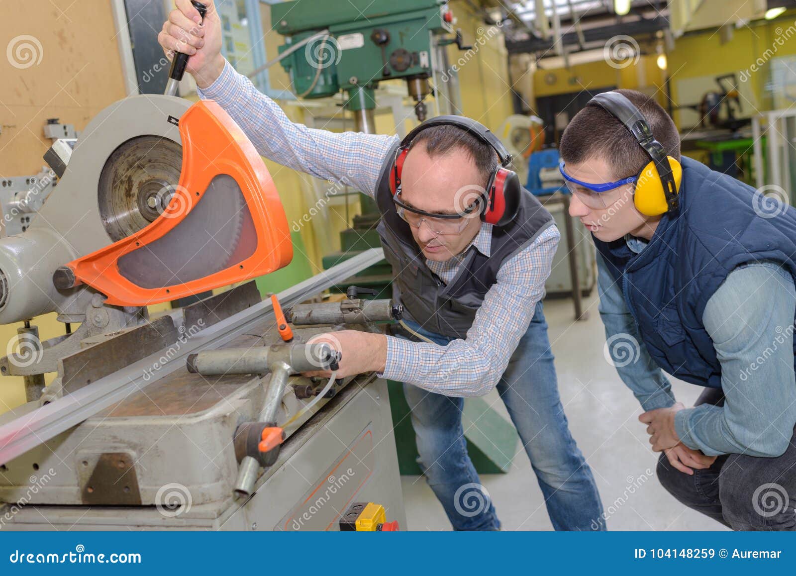 Industrial Workers Using Metal Cutter Machine Stock Image - Image of ...