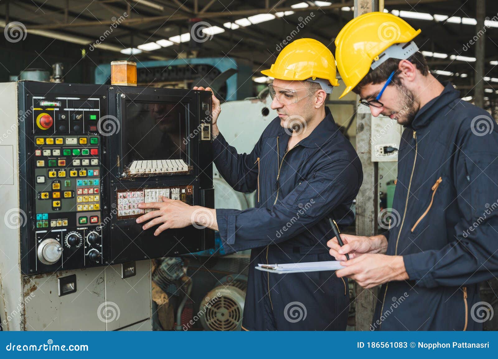 Industrial Workers are Working on Projects in Large Industrial Plants ...