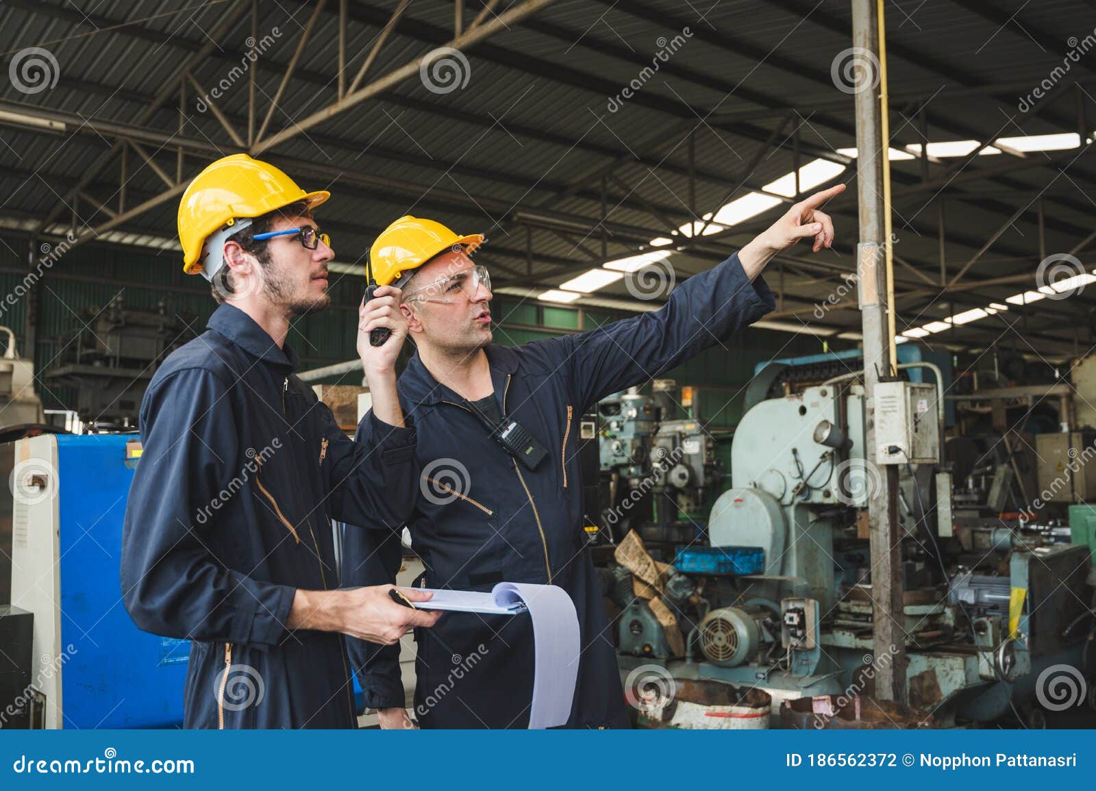 Industrial Workers are Working on Projects in Large Industrial Plants ...