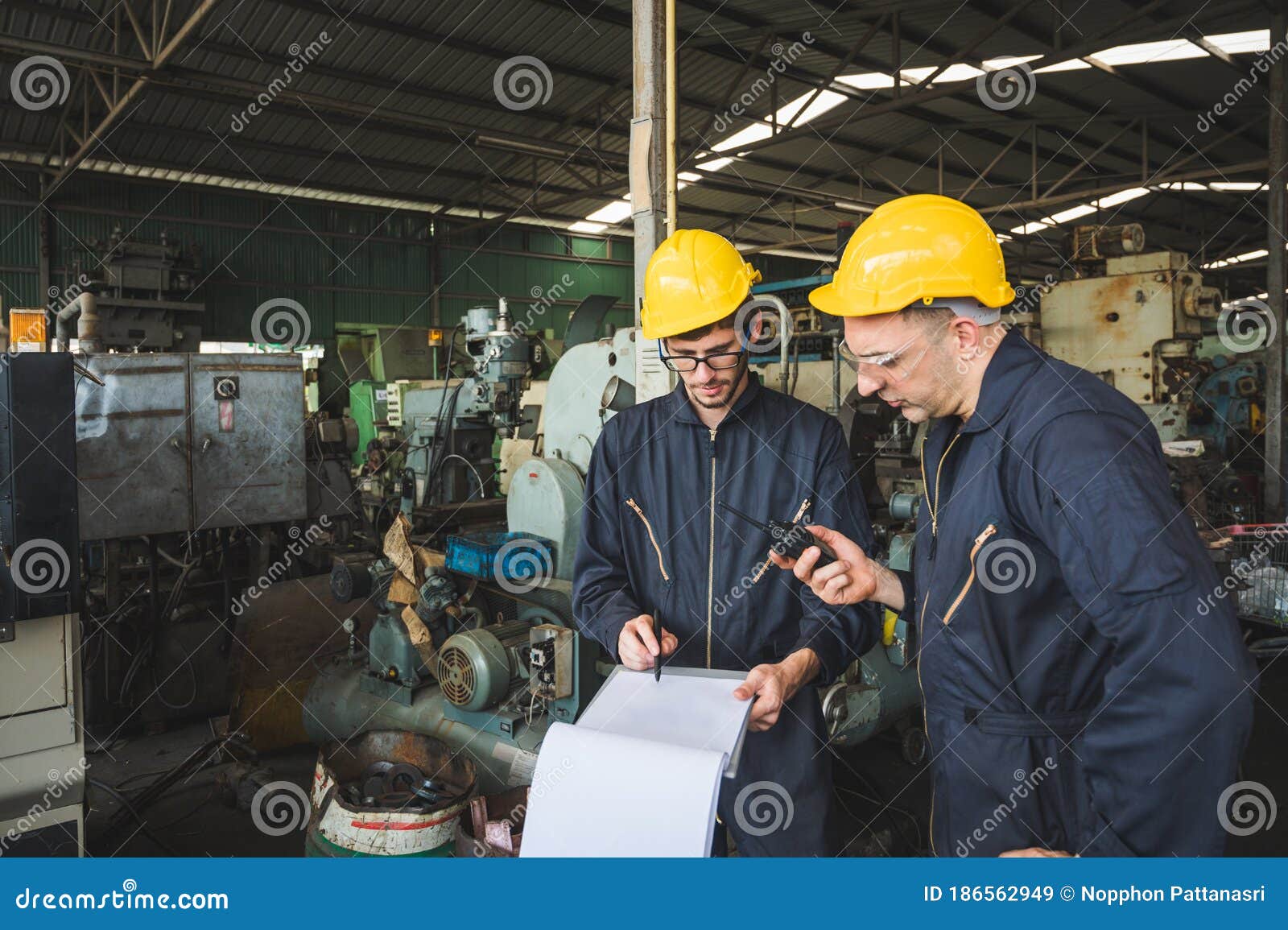 Industrial Workers are Working on Projects in Large Industrial Plants ...