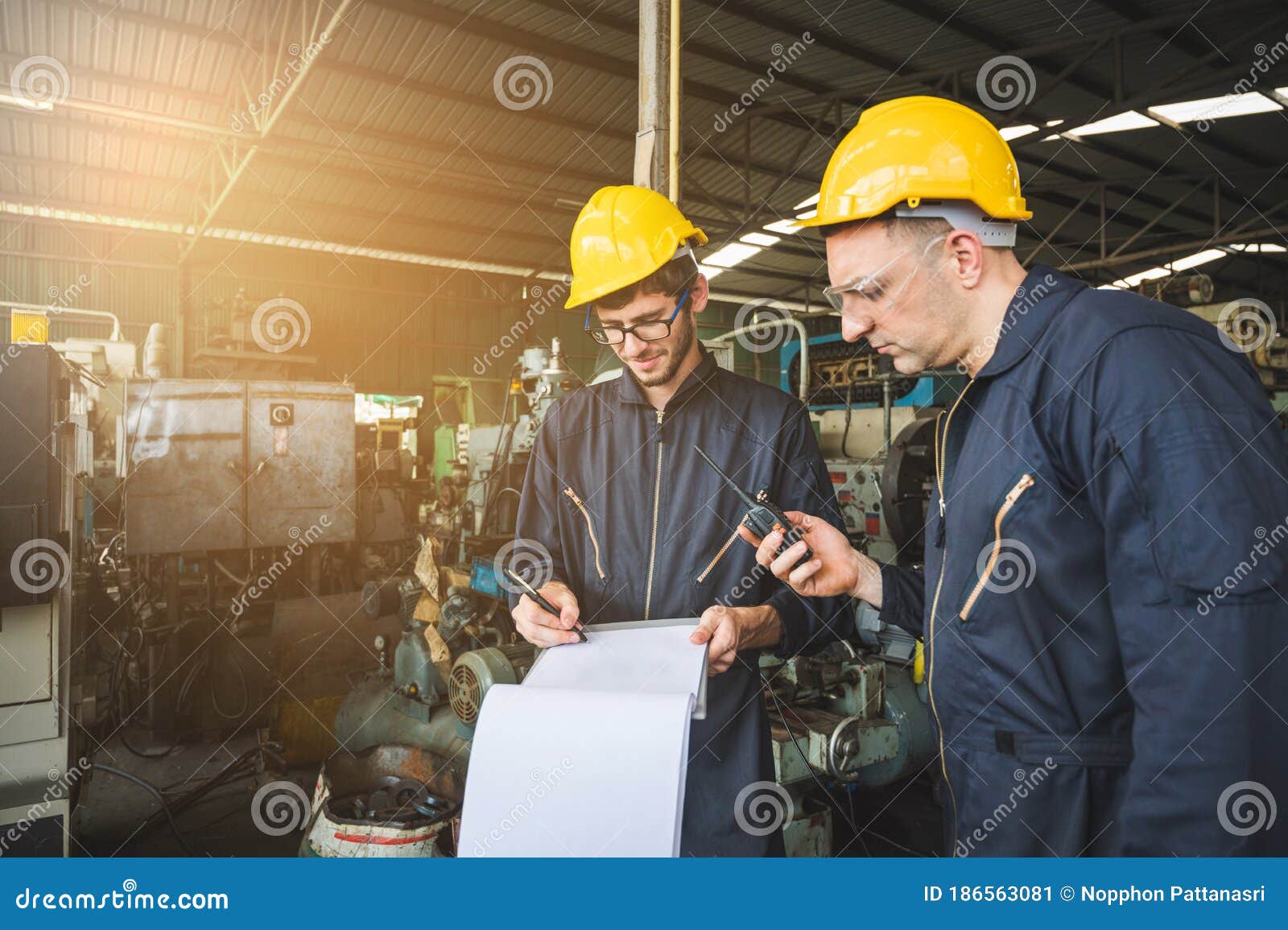 Industrial Workers are Working on Projects in Large Industrial Plants ...