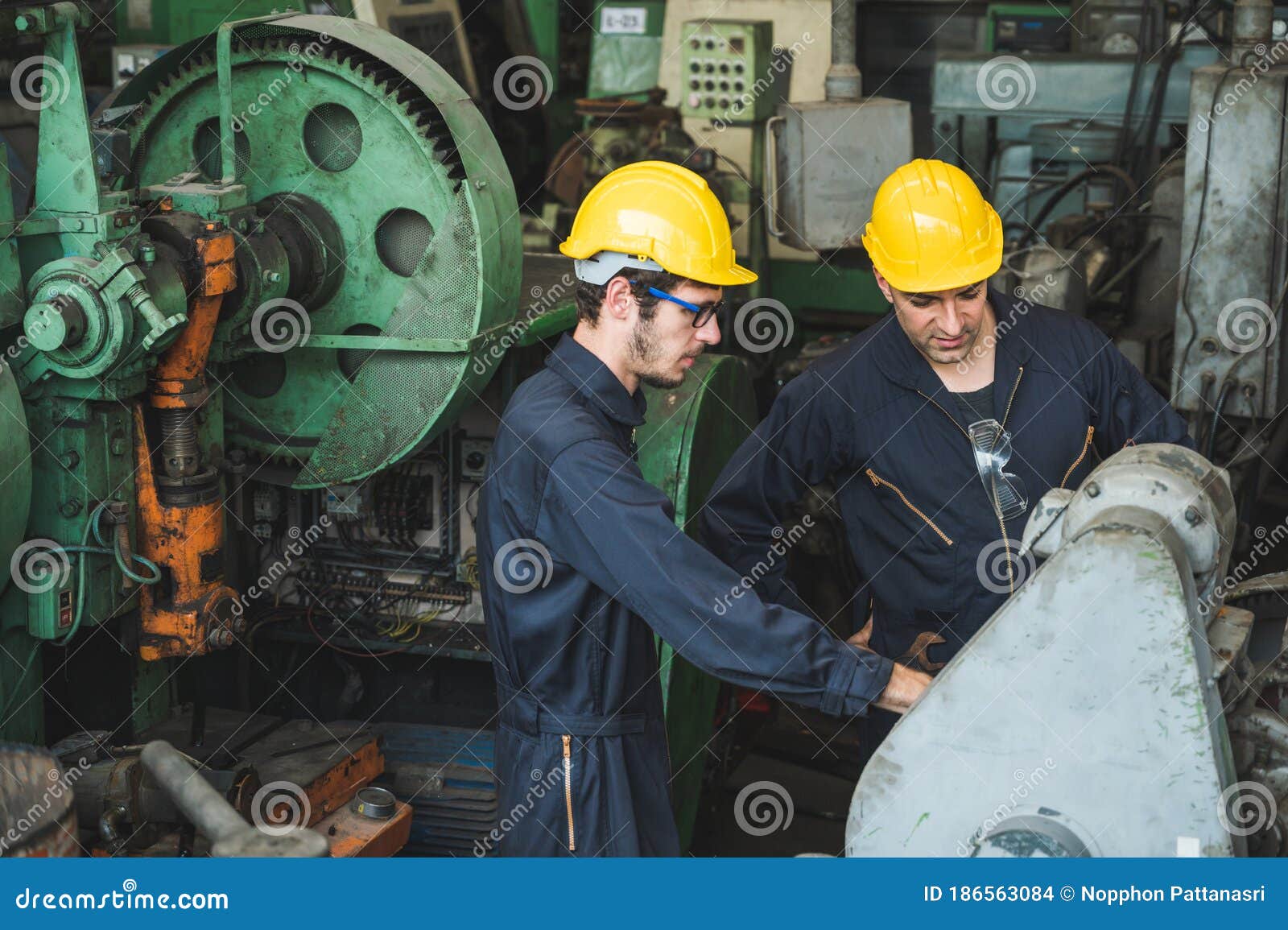 Industrial Workers are Working on Projects in Large Industrial Plants ...