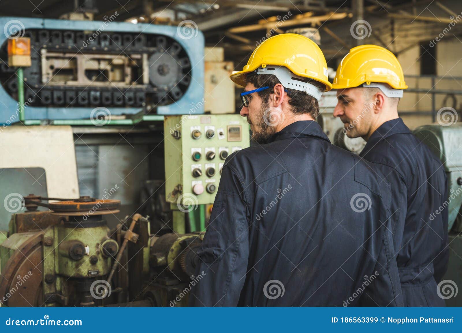 Industrial Workers are Working on Projects in Large Industrial Plants ...