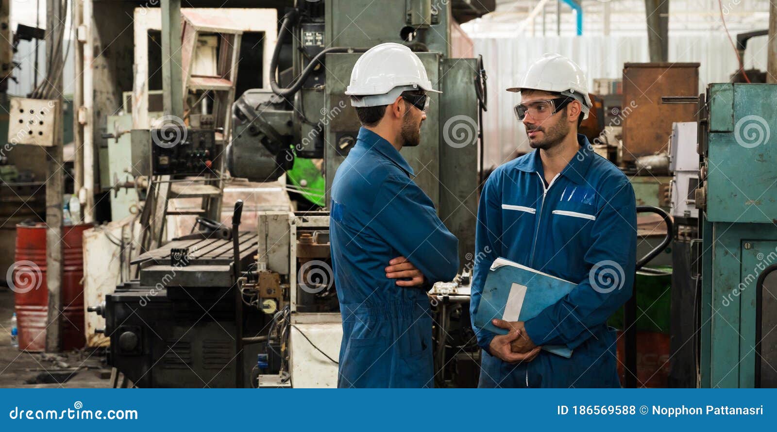 Industrial Workers are Working on Projects in Large Industrial Plants ...