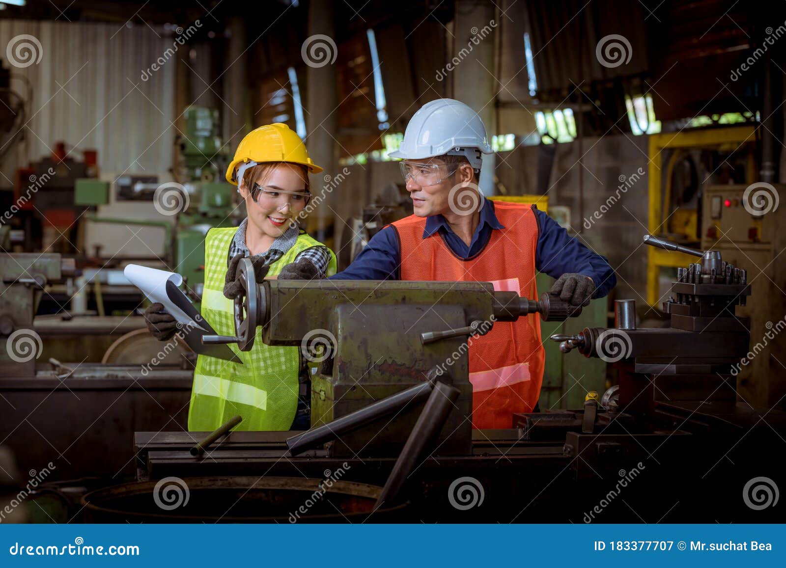 Industry Engineer Under Inspection and Checking Production Process on ...