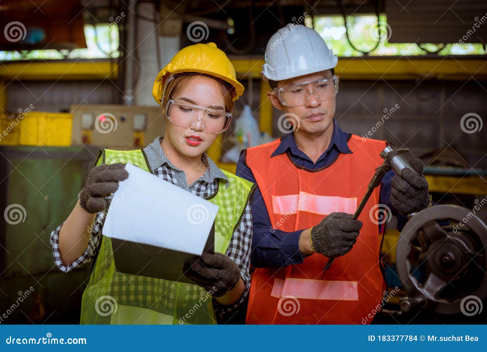 Industry Engineer Under Inspection and Checking Production Process on ...