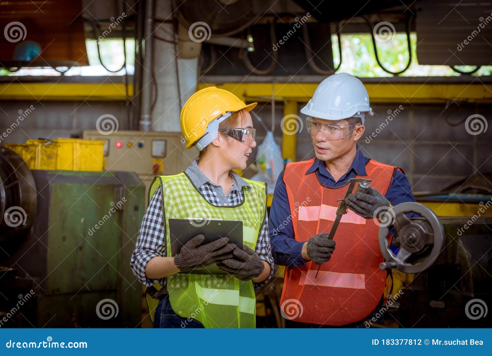 Industry Engineer Under Inspection and Checking Production Process on ...