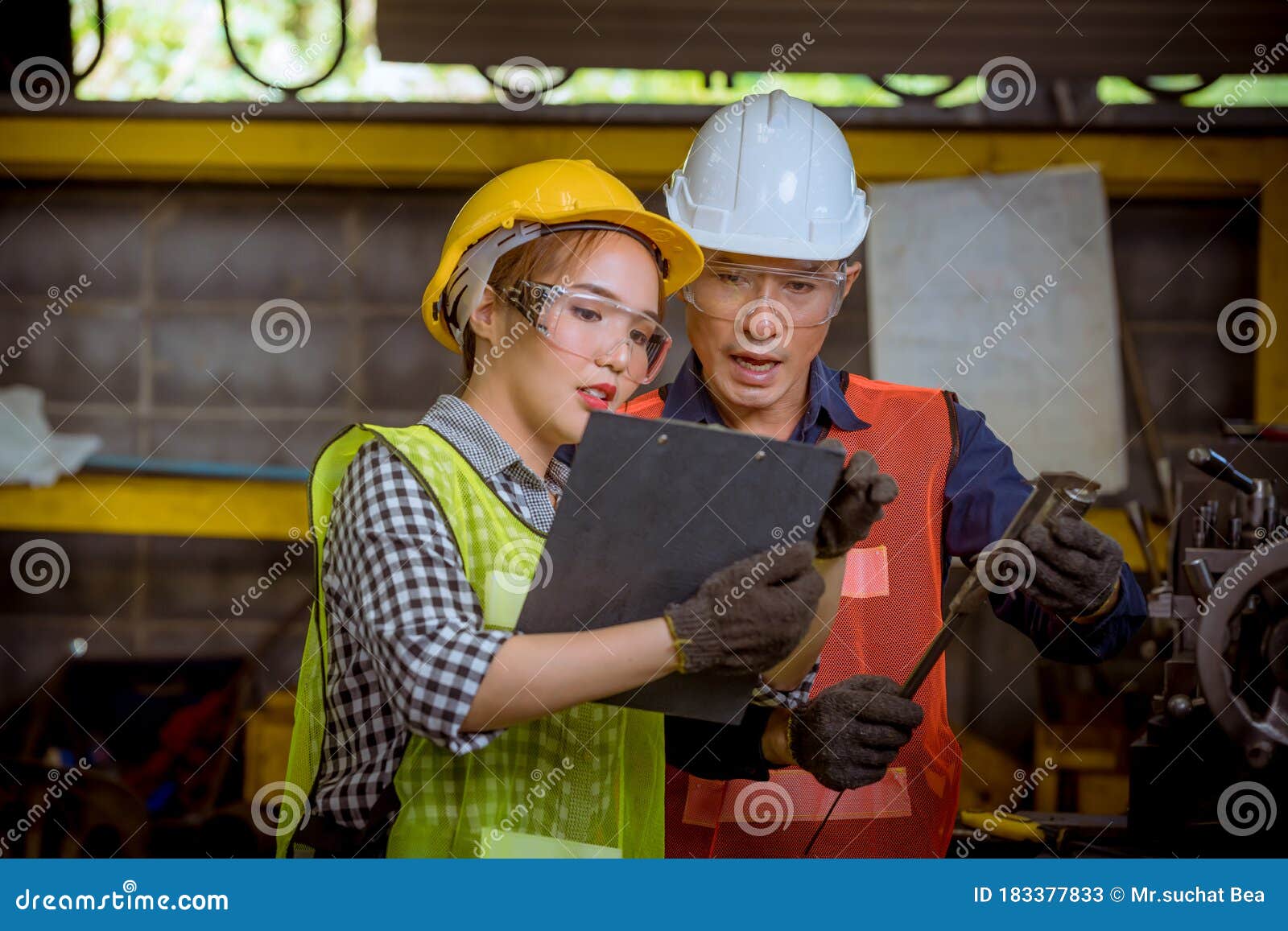 Industry Engineer Under Inspection and Checking Production Process on ...