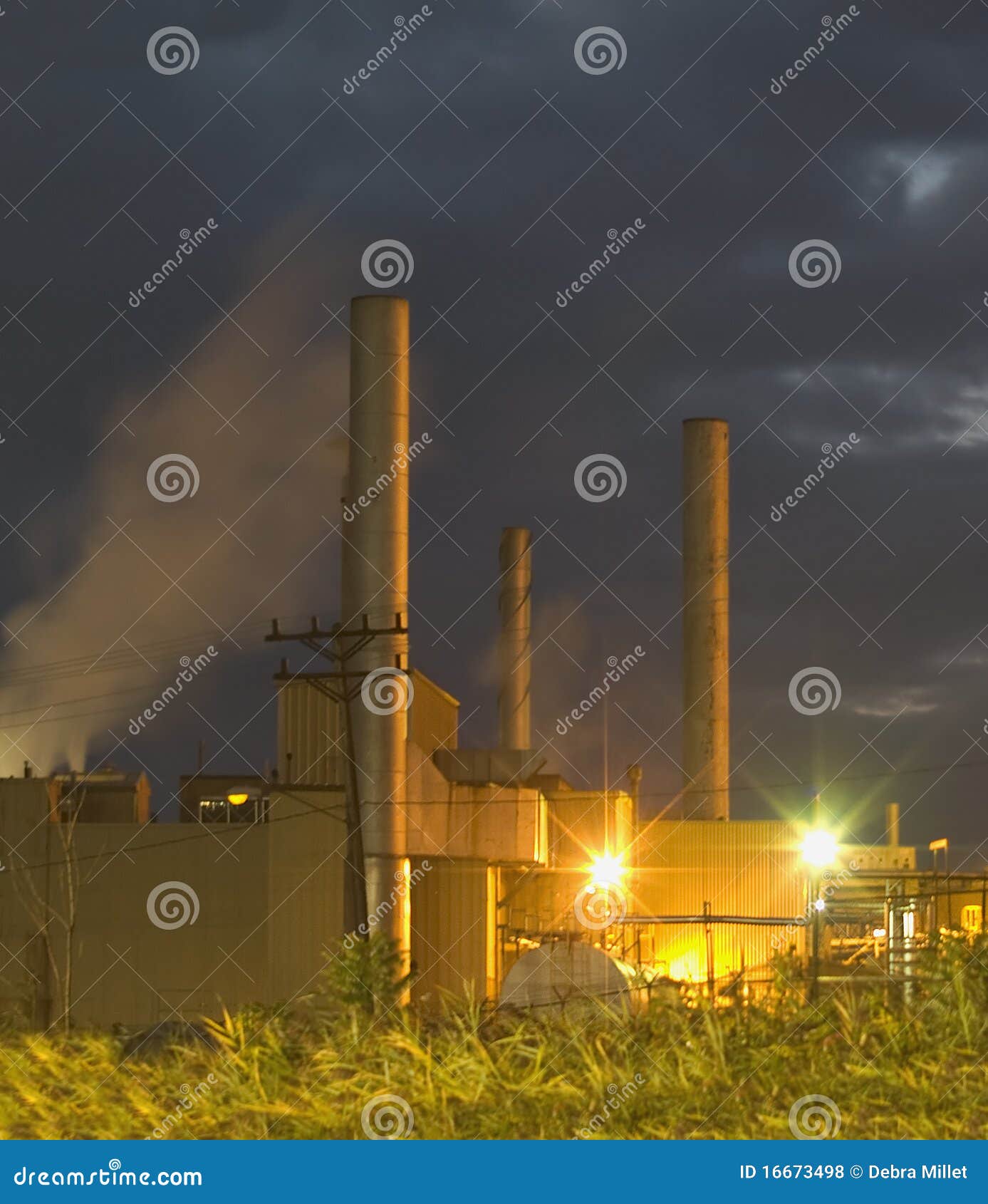 Industry at night vertical stock photo. Image of city - 16673498