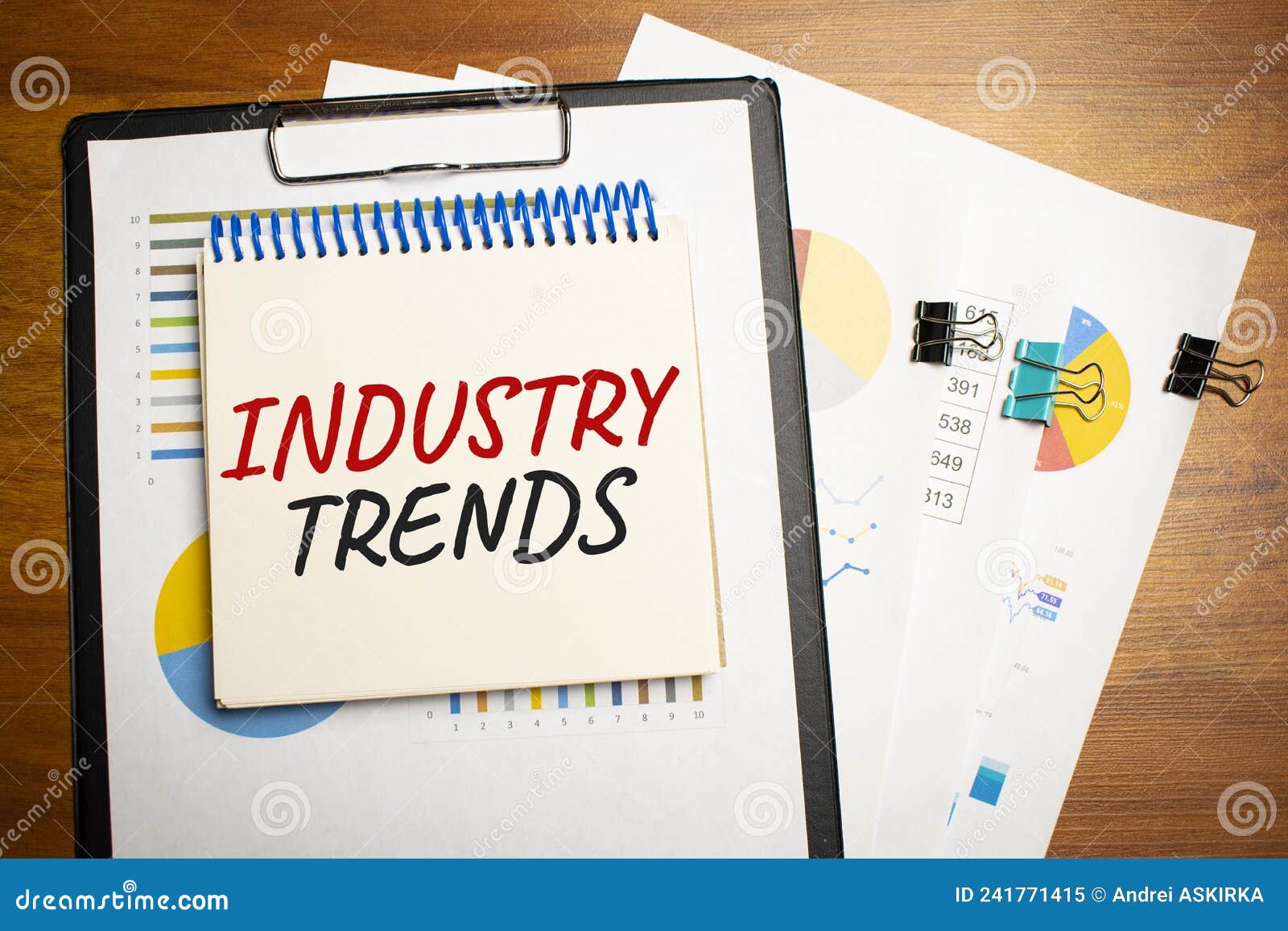 INDUSTRY TRENDS is Written on a Notepad on an Office Desk Stock Image ...