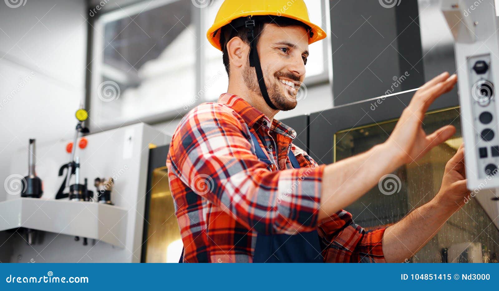 Industry Worker Entering Data in CNC Machine at Factory Stock Image ...