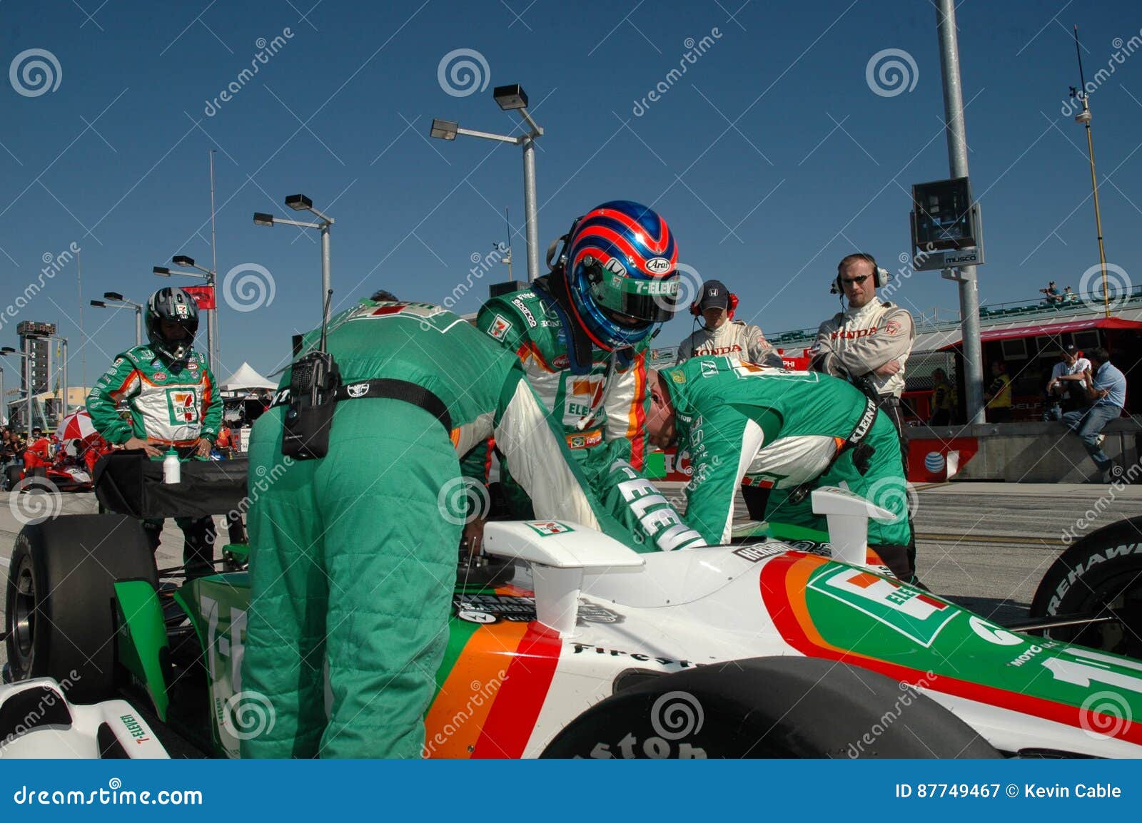 Indy driver getting in car editorial photography. Image of suit - 87749467