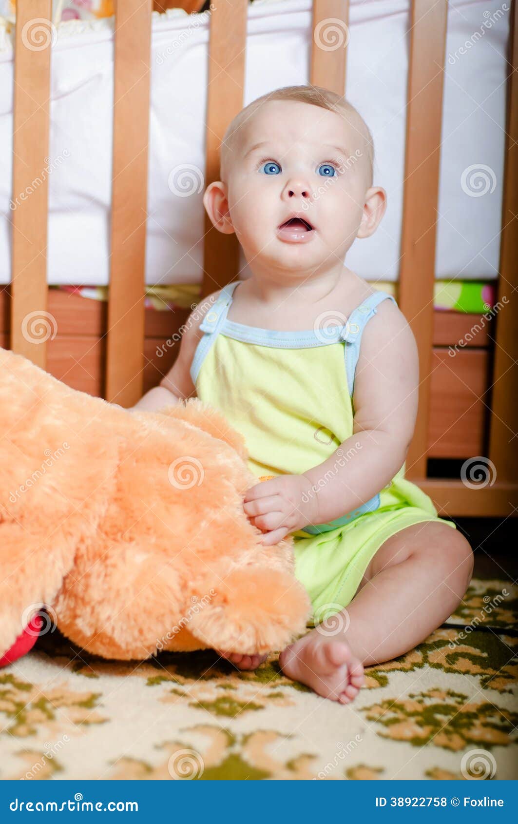 Infant Baby Playing on the Floor at Home Stock Photo - Image of facial ...