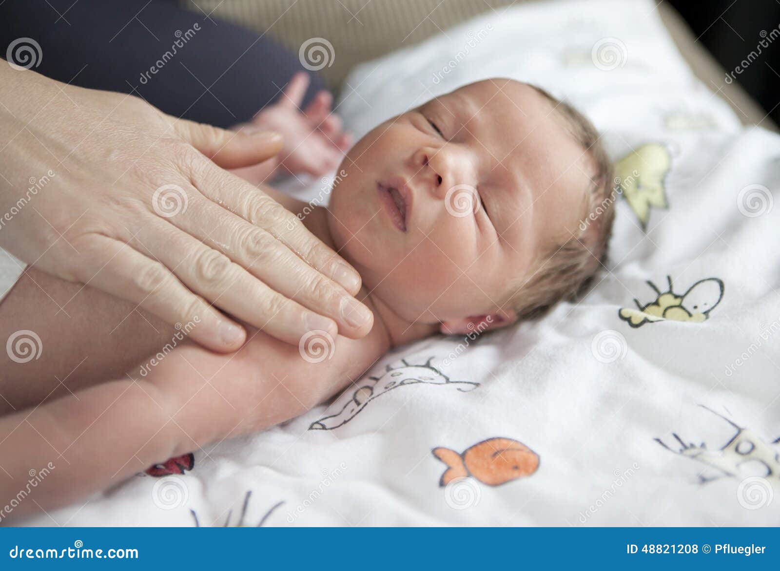 Infant being caressed stock photo. Image of white, love - 48821208