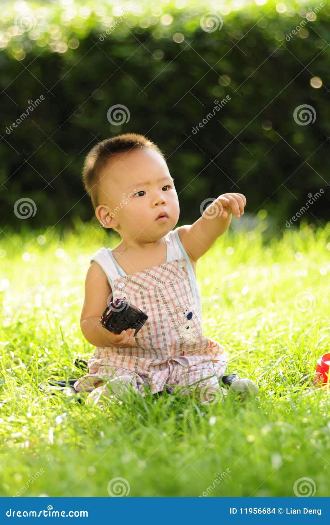 Infant boy pointing stock photo. Image of play, chinese - 11956684