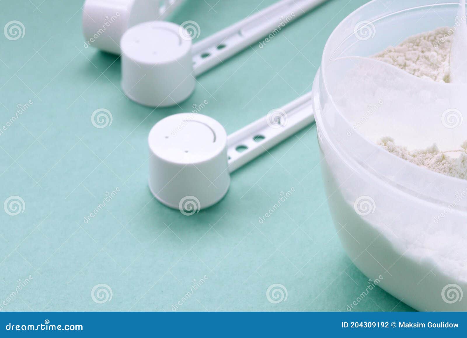 Infant Formula and Spoon. Container with Infant Formula and Baby Spoons ...