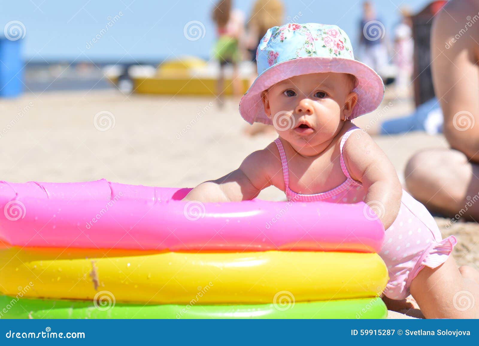 Infant girl on a beach stock image. Image of swim, swimsuit - 59915287