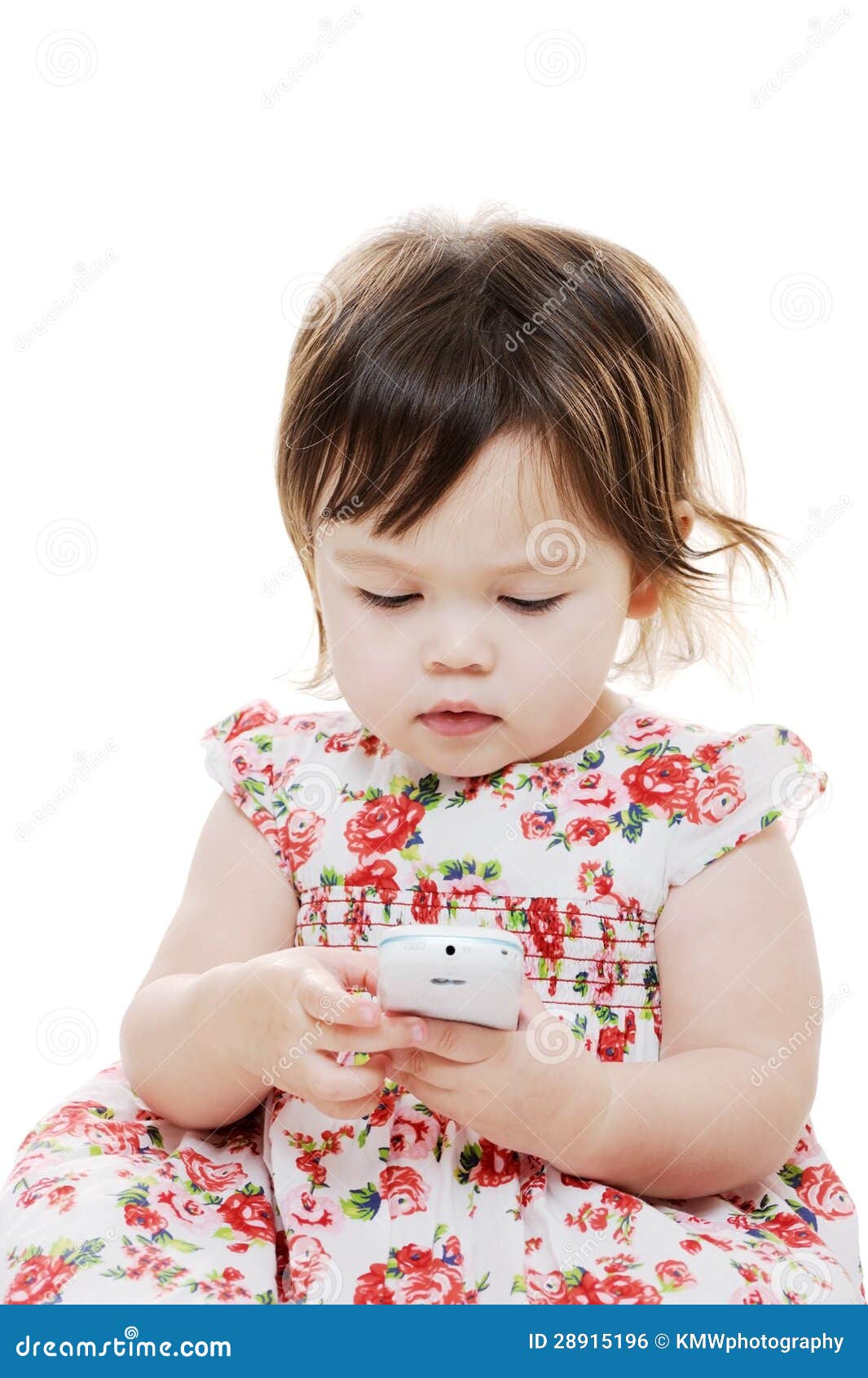 Infant girl with phone stock photo. Image of concentrating - 28915196