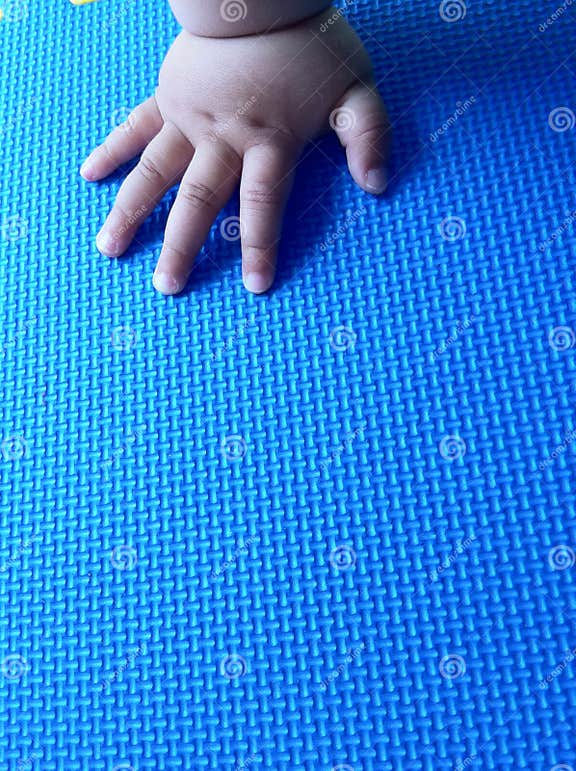 Infant hand on the mat stock photo. Image of infant, issues - 19414894