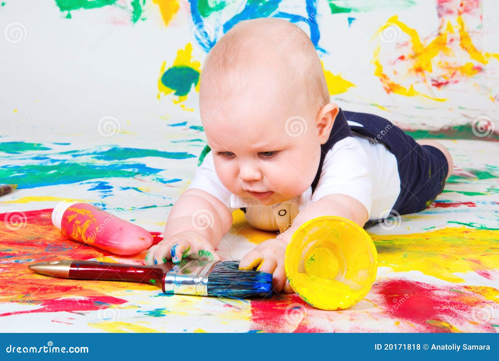 Infant Playing with Paintbrush Stock Photo - Image of pretty, caucasian ...