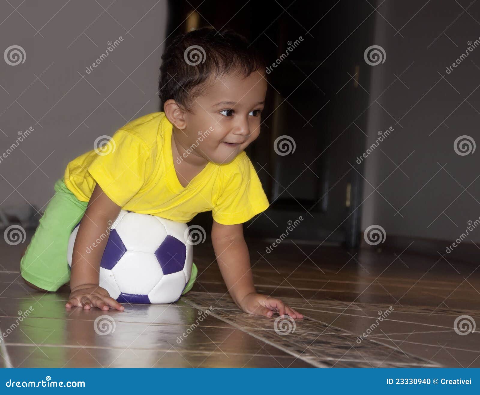 Infant Playing Soccer stock photo. Image of innocent - 23330940