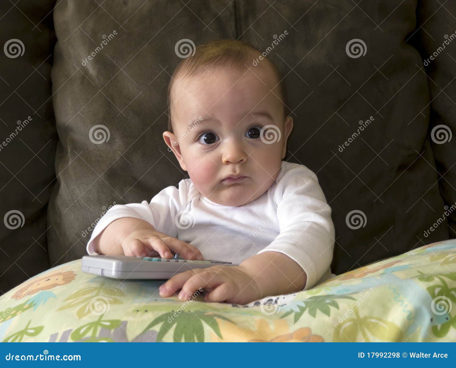 Infant with Remote stock photo. Image of background, people - 17992298