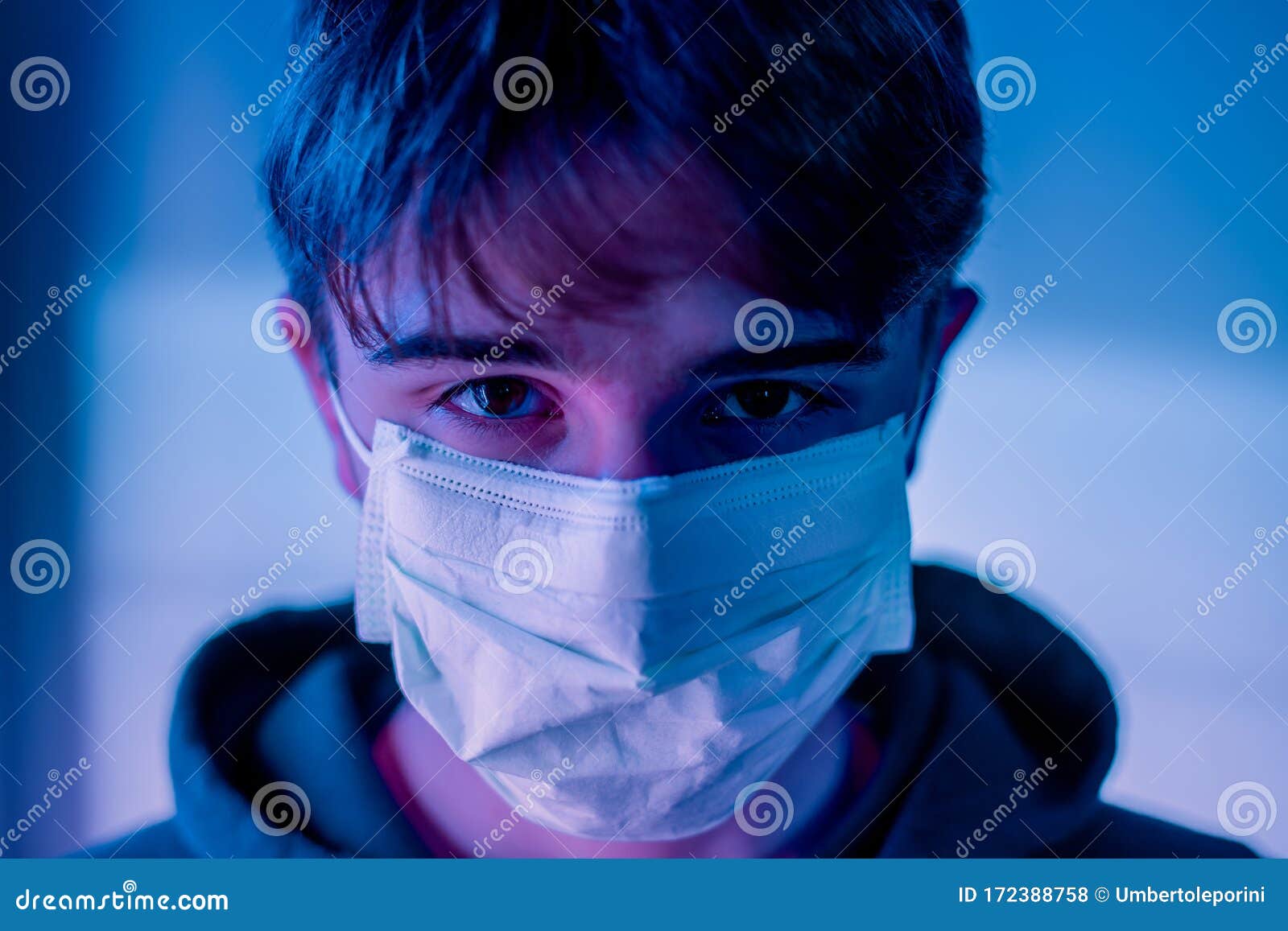 Young Man with Protective Mask Infection Fear Concept Stock Photo ...