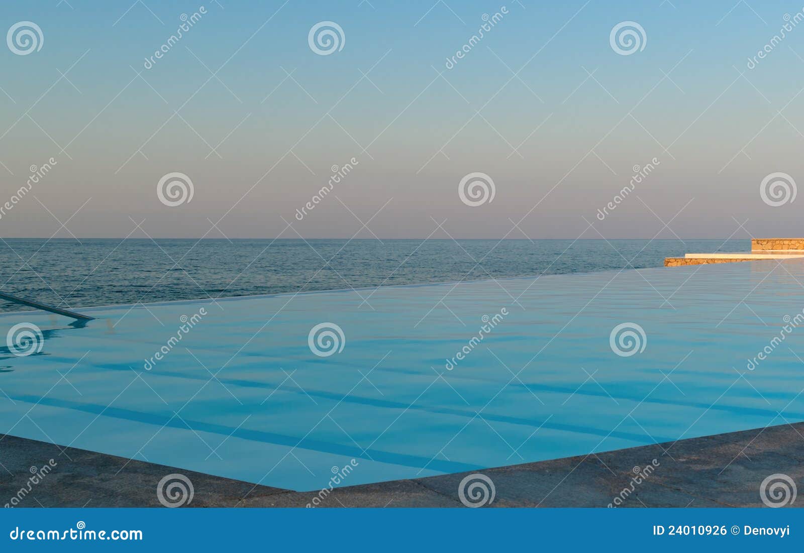 Infinity Pool on the Beach at Sunset Stock Photo - Image of design ...