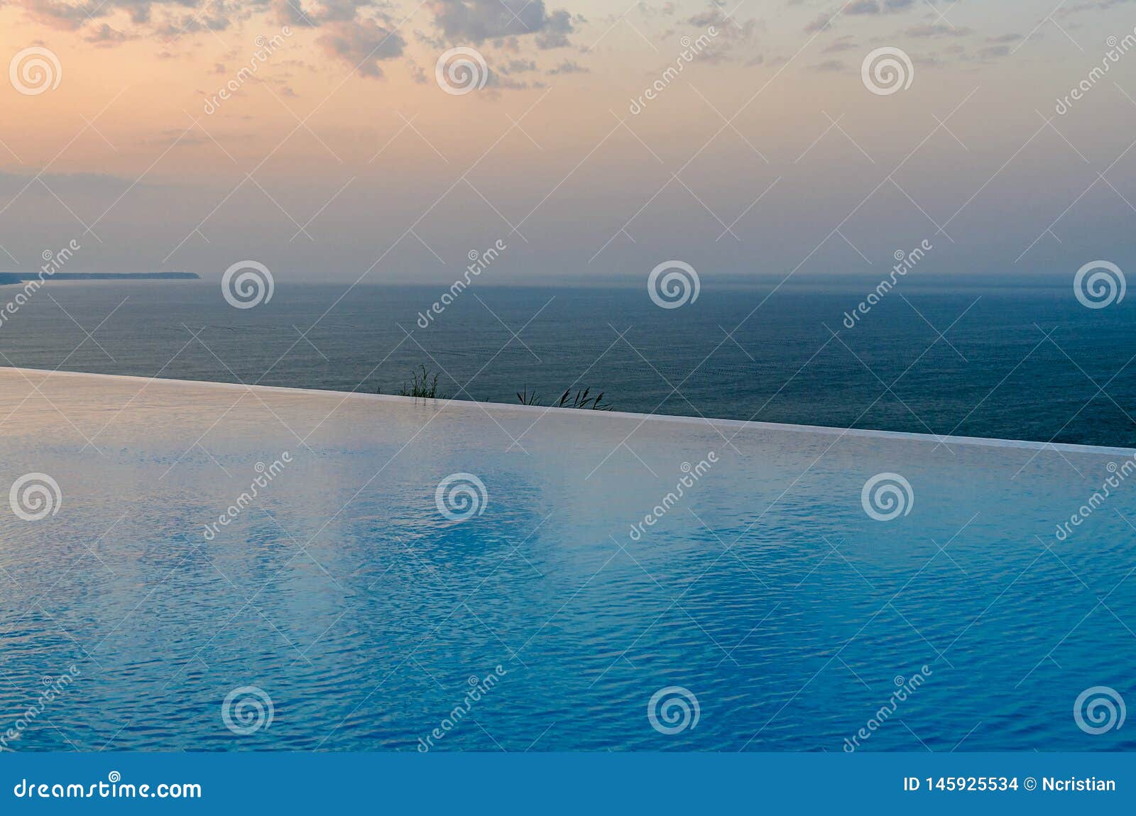 Infinity Pool with Crystal Blue Water View To Sea Ocean Stock Photo ...