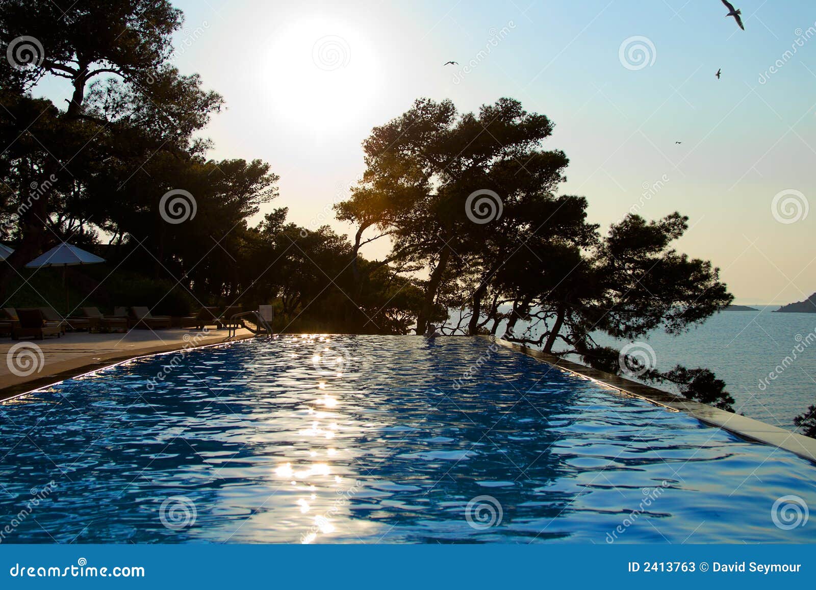 Infinity pool - evening stock image. Image of tourism - 2413763