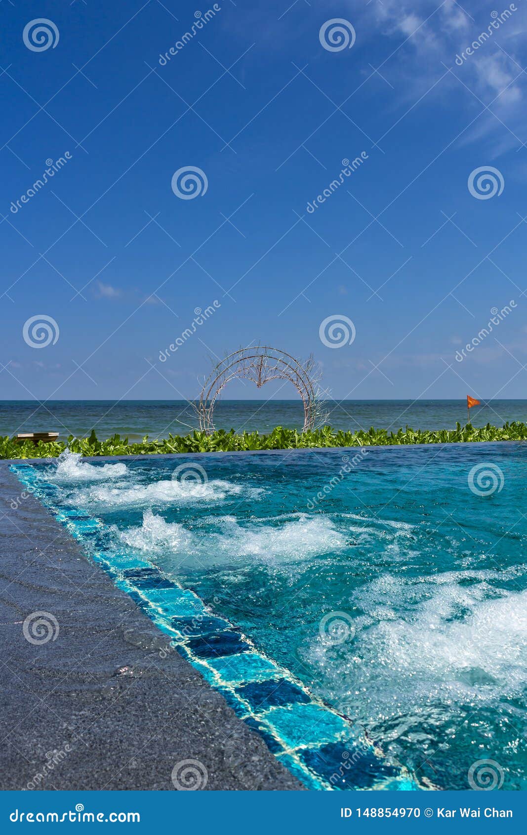 An Infinity Pool with Jacuzzi at a Beach Resort Stock Photo - Image of ...