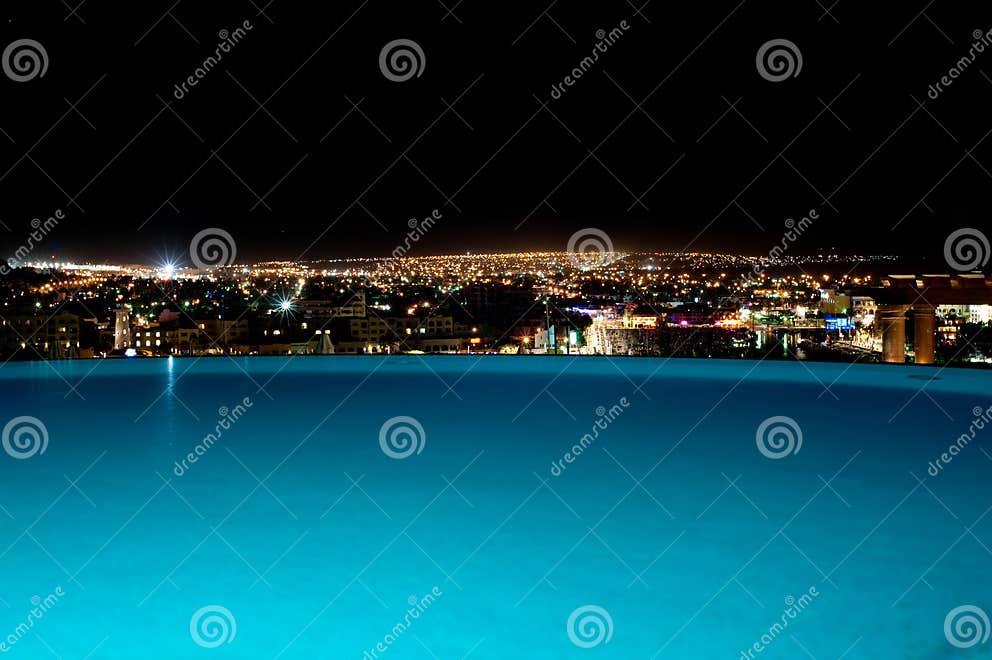 INFINITY POOL NIGHT SKYLINE Stock Photo - Image of cabo, inifinty: 14443196
