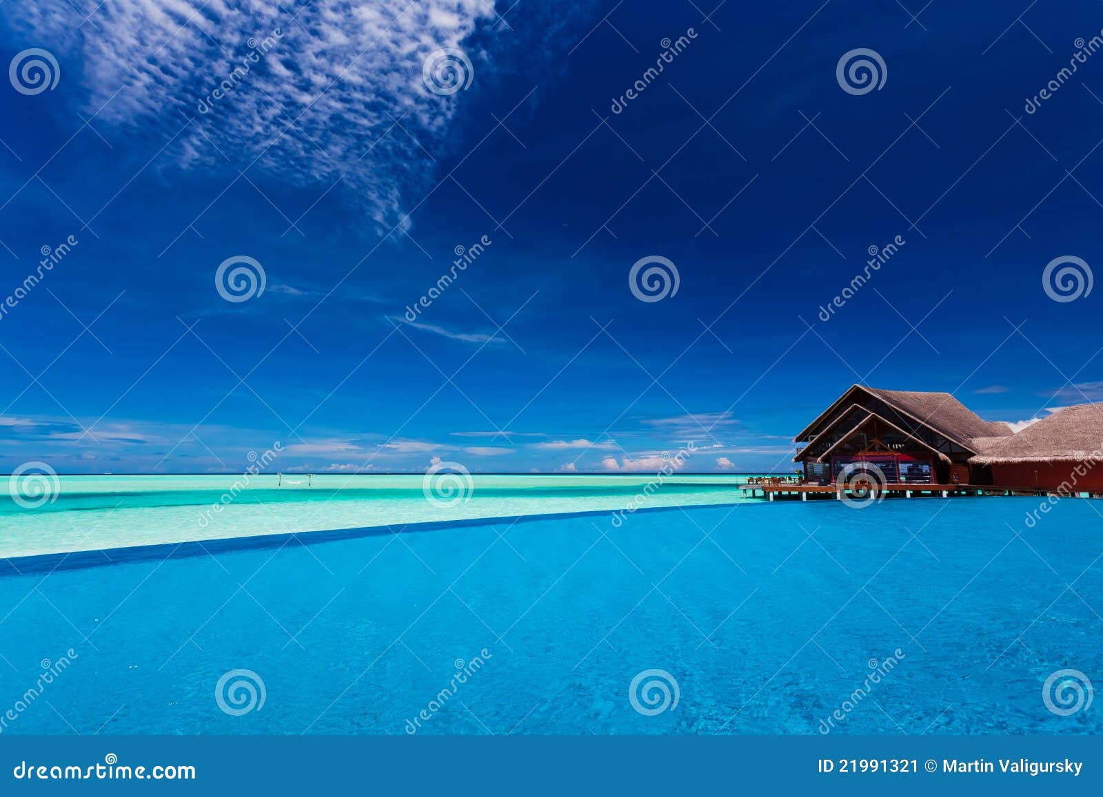 Infinity Pool Over Tropical Lagoon with Blue Sky Stock Image - Image of ...