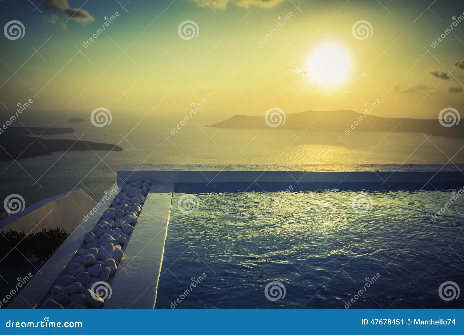 Infinity Pool with Stones at Sunset in Santorini Island Stock Image ...