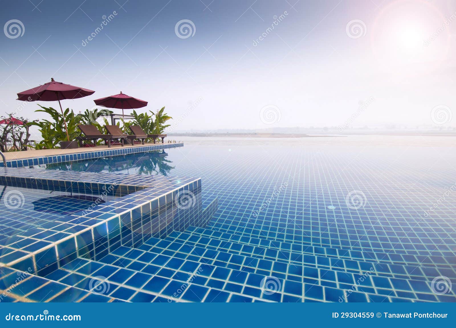 Infinity Riverside Swimming Pool Stock Image - Image of colorful, blue ...