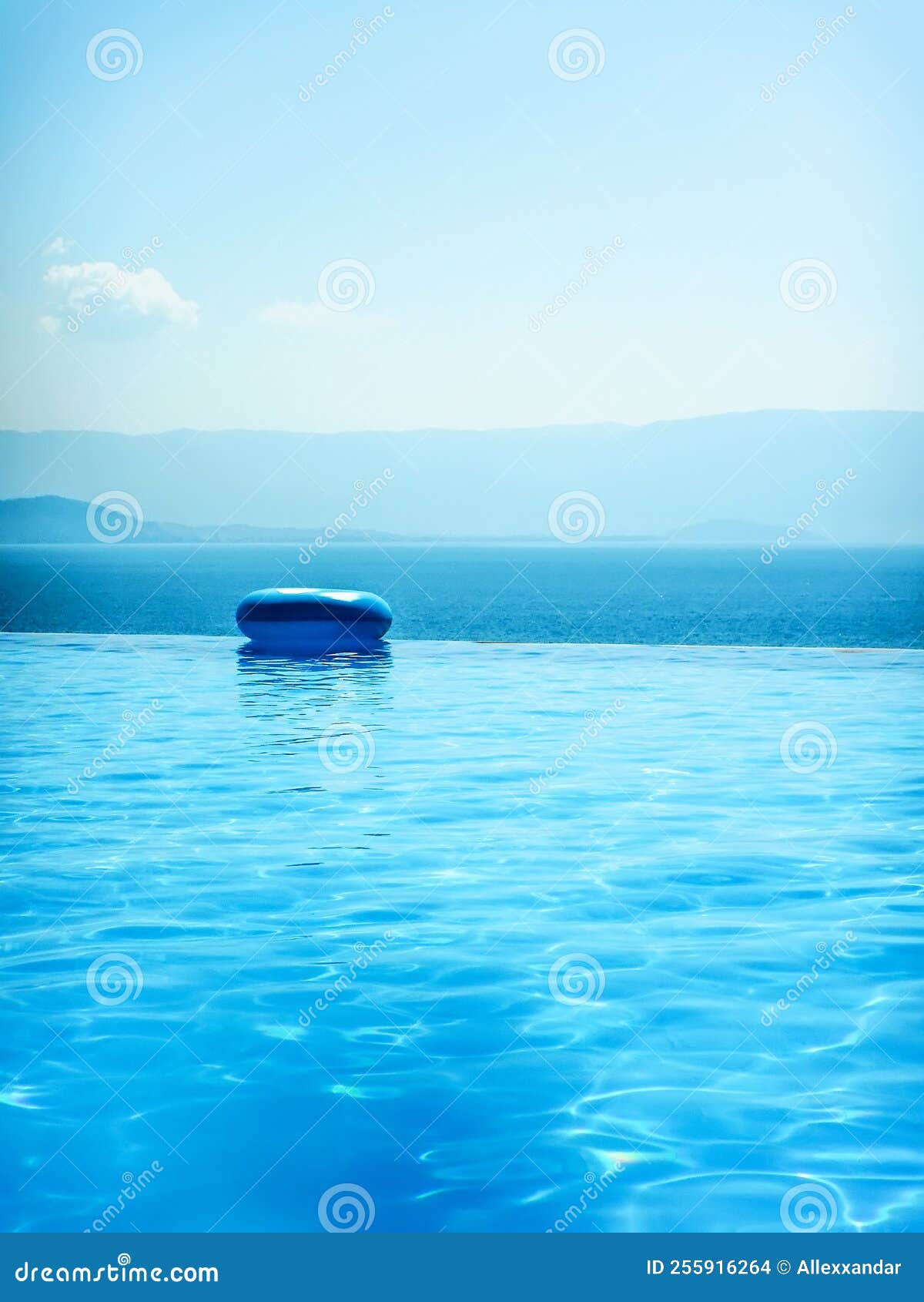 Infinity Swimming Pool with Sea and Mountain View Stock Photo - Image ...