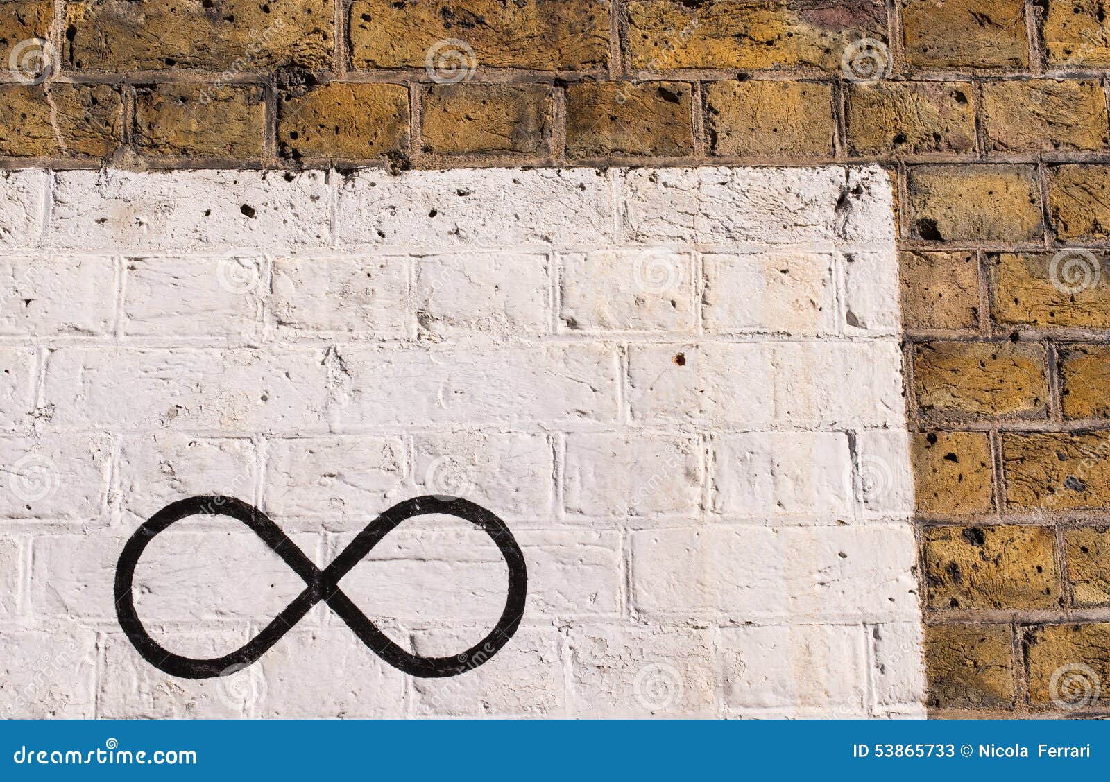 The Infinity Symbol Drawn In Black On A Brick Wall Stock Image ...