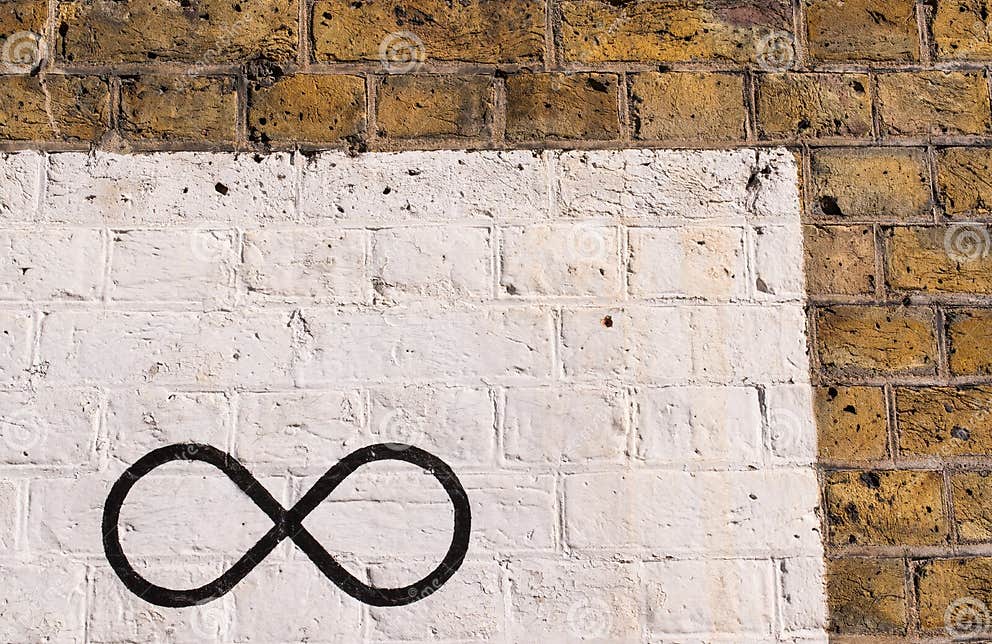 The Infinity Symbol Drawn in Black on a Brick Wall Stock Image - Image ...