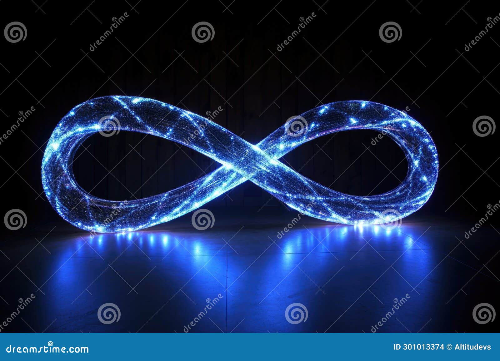 Infinity Symbol Made from a Twisted, Glowing Led Light Strip in a Dark ...
