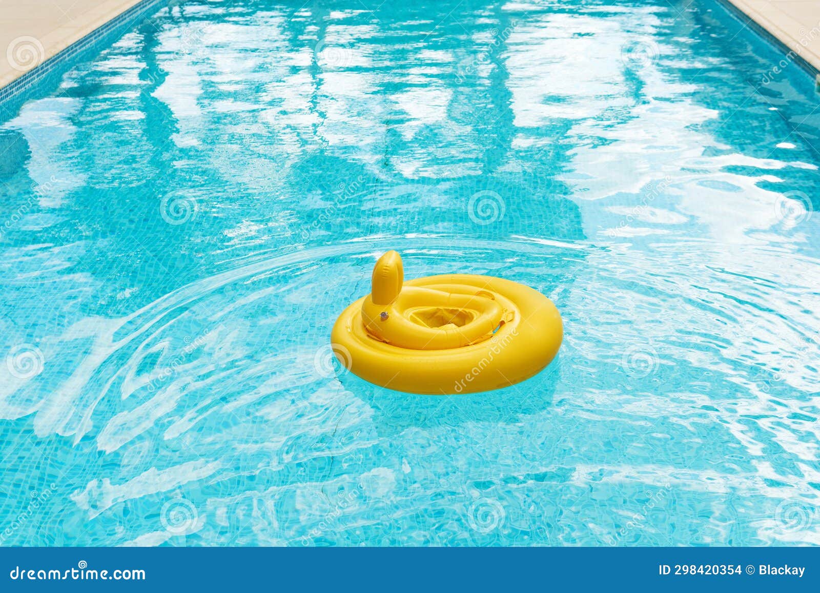 Inflatable Baby Float Ring in Open-air Swimming Pool Stock Photo ...