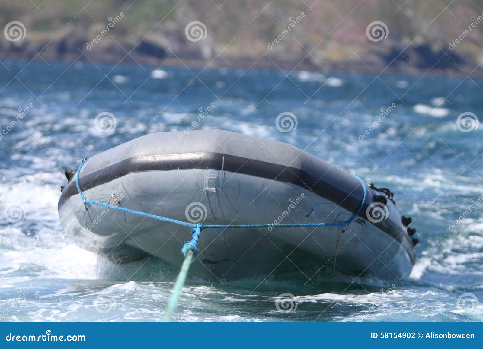 Inflatable Boat Being Towed Stock Photo - Image of water, inflatable ...