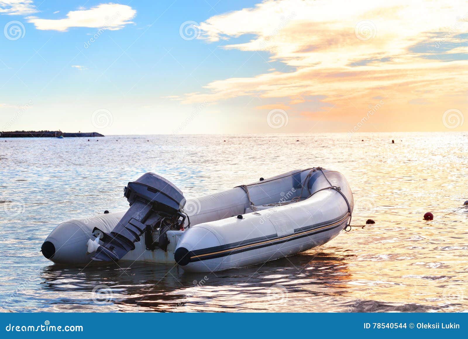 Inflatable Boat with a Motor in the Bay Stock Photo - Image of race ...