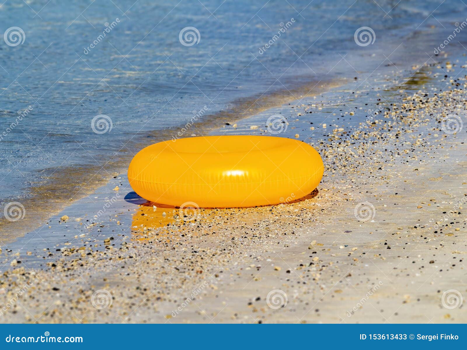 Inflatable Circle on the Beach Stock Image - Image of beach, rubber ...