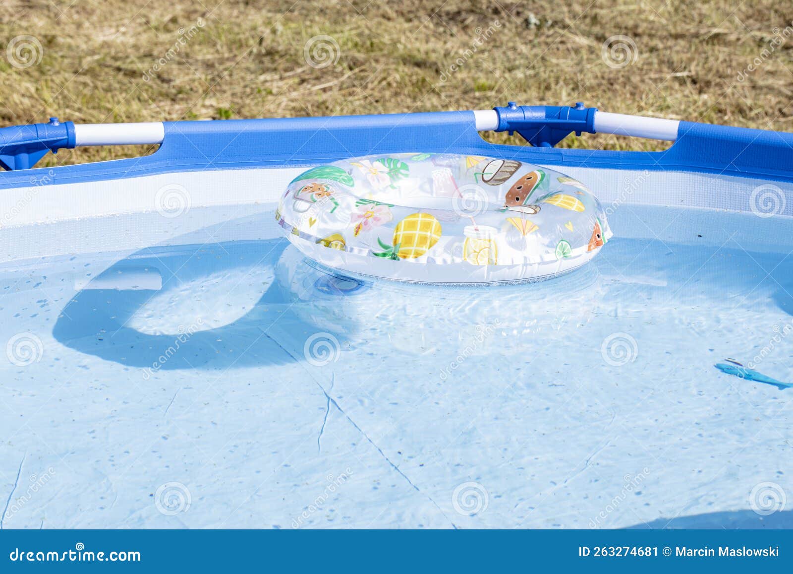 An Inflatable Circle Floats on the Water in the Pool Stock Image ...