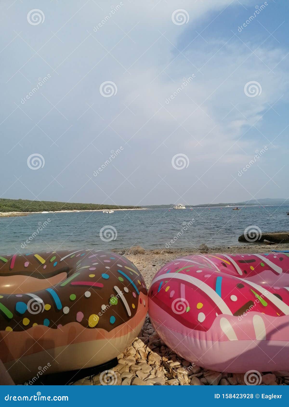 Inflatable Donut on the Beach Stock Photo - Image of beach, donut ...
