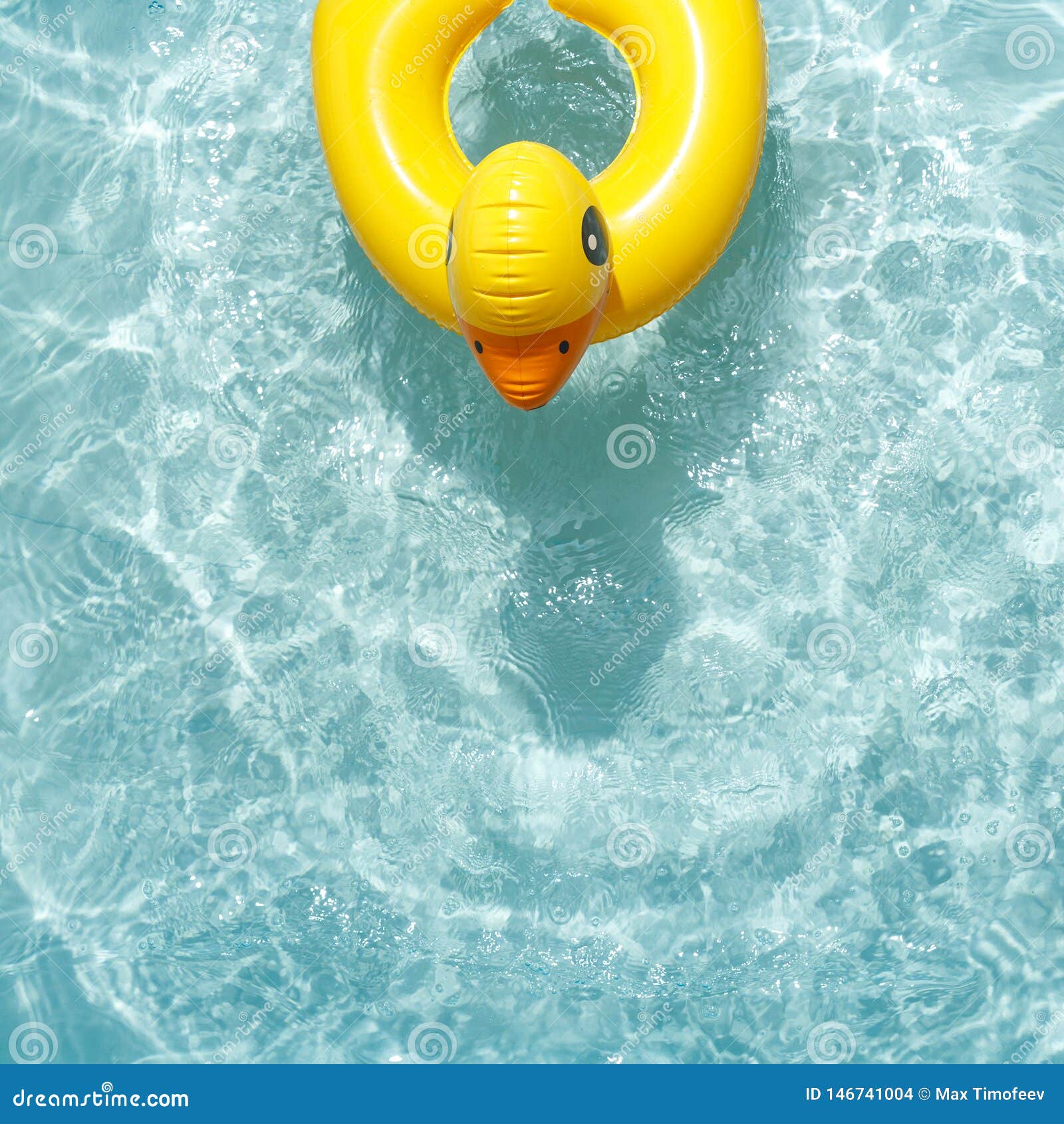 Inflatable Float Rubber Ring in the Shape of a Yellow Duckling in Blue ...